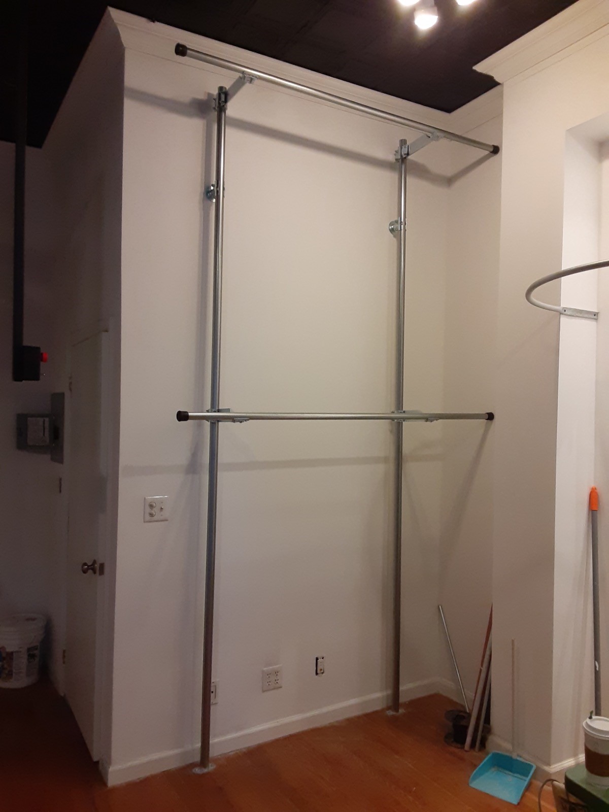 Railex System 200 Slick Rail in Alterations Room - Railex Conveyor Corp.